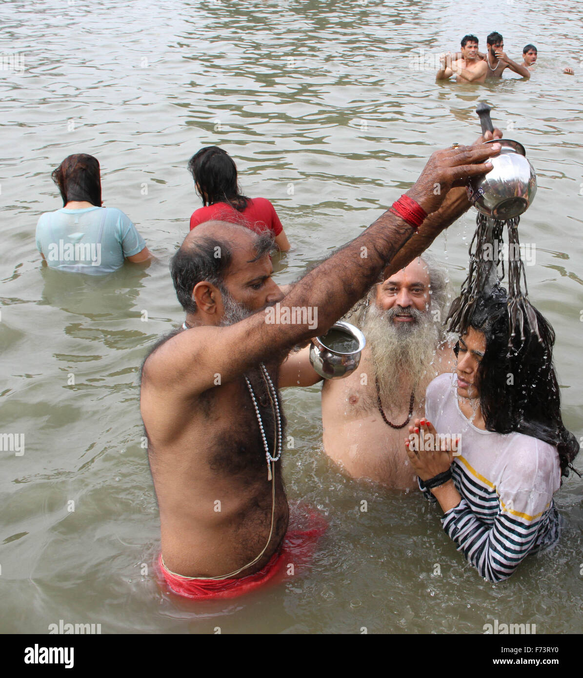 Jammu, India. 25th November, 2015. Devotees performing Puja after holy ...