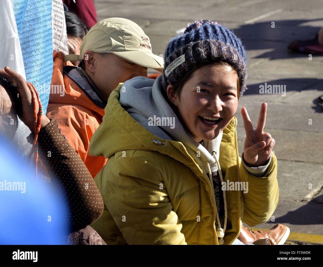 Lhasa, China's Tibet Autonomous Region. 25th Nov, 2015. Tourists attend ...