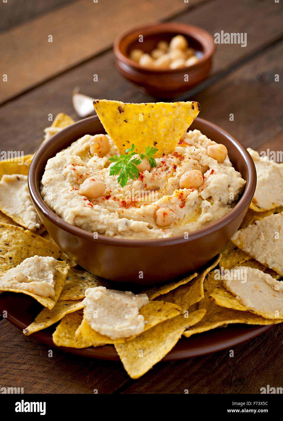 Healthy homemade hummus with olive oil and pita chips Stock Photo - Alamy