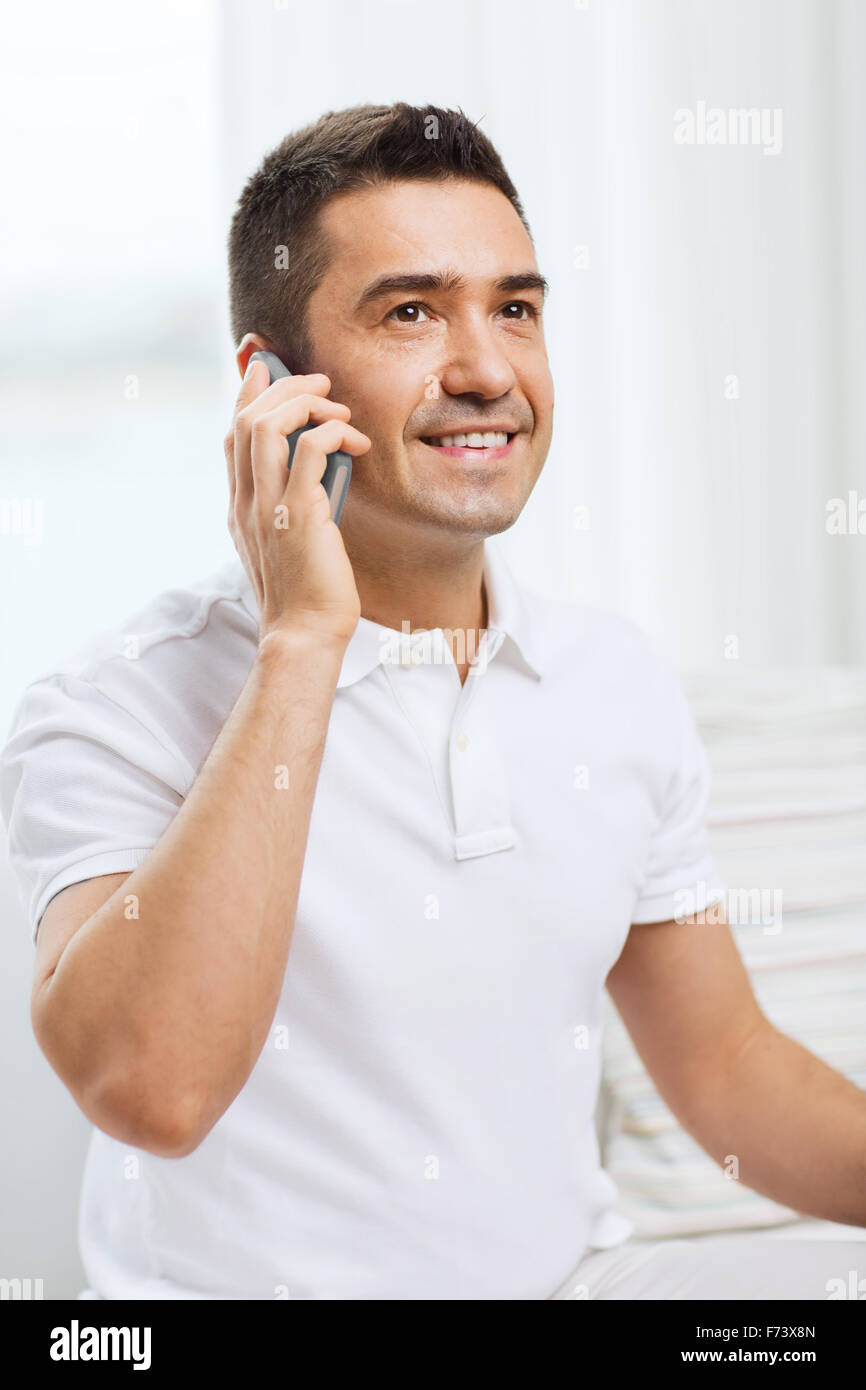Happy man making phone call hi-res stock photography and images - Alamy