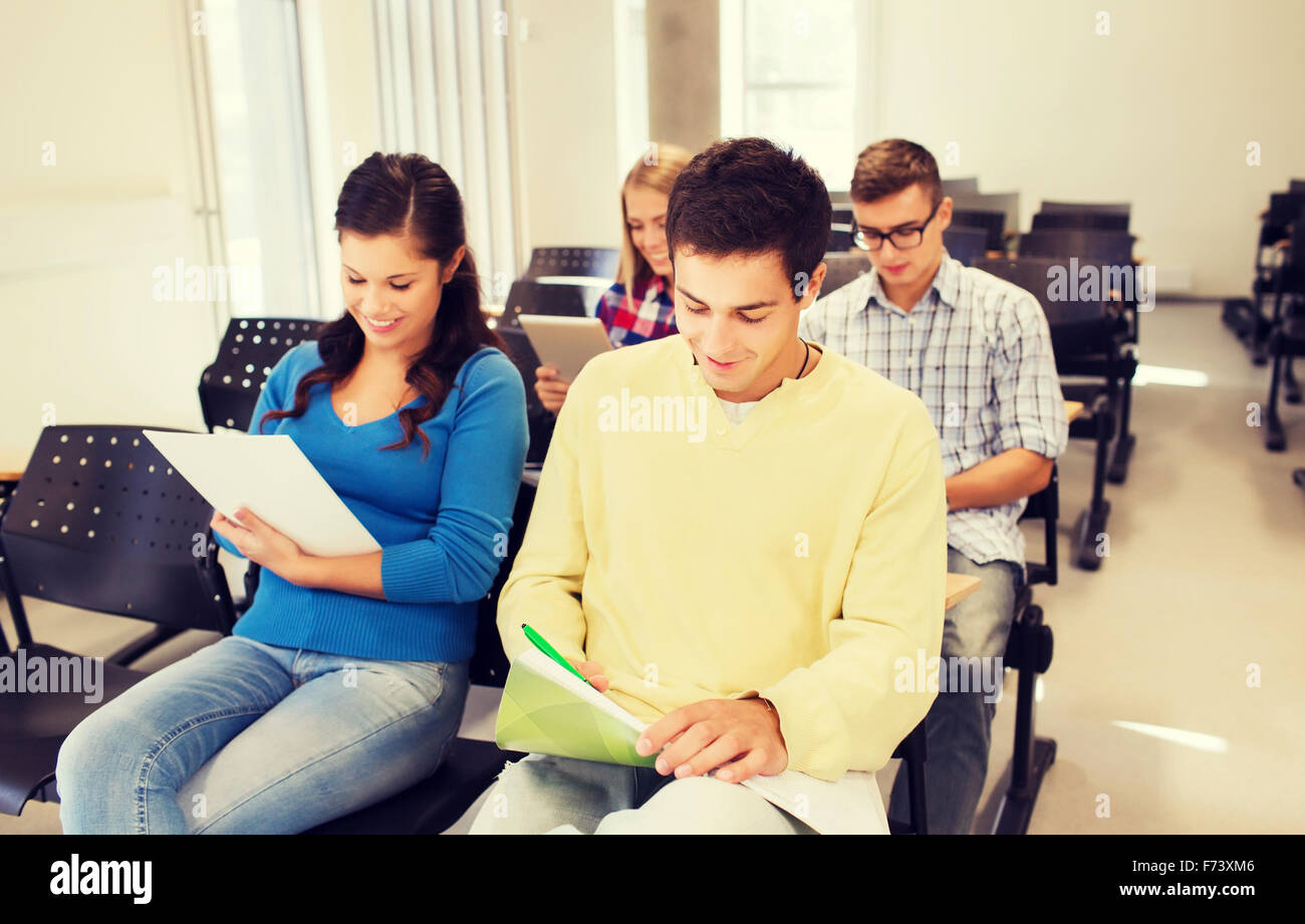 group of smiling students in lecture hall Stock Photo - Alamy