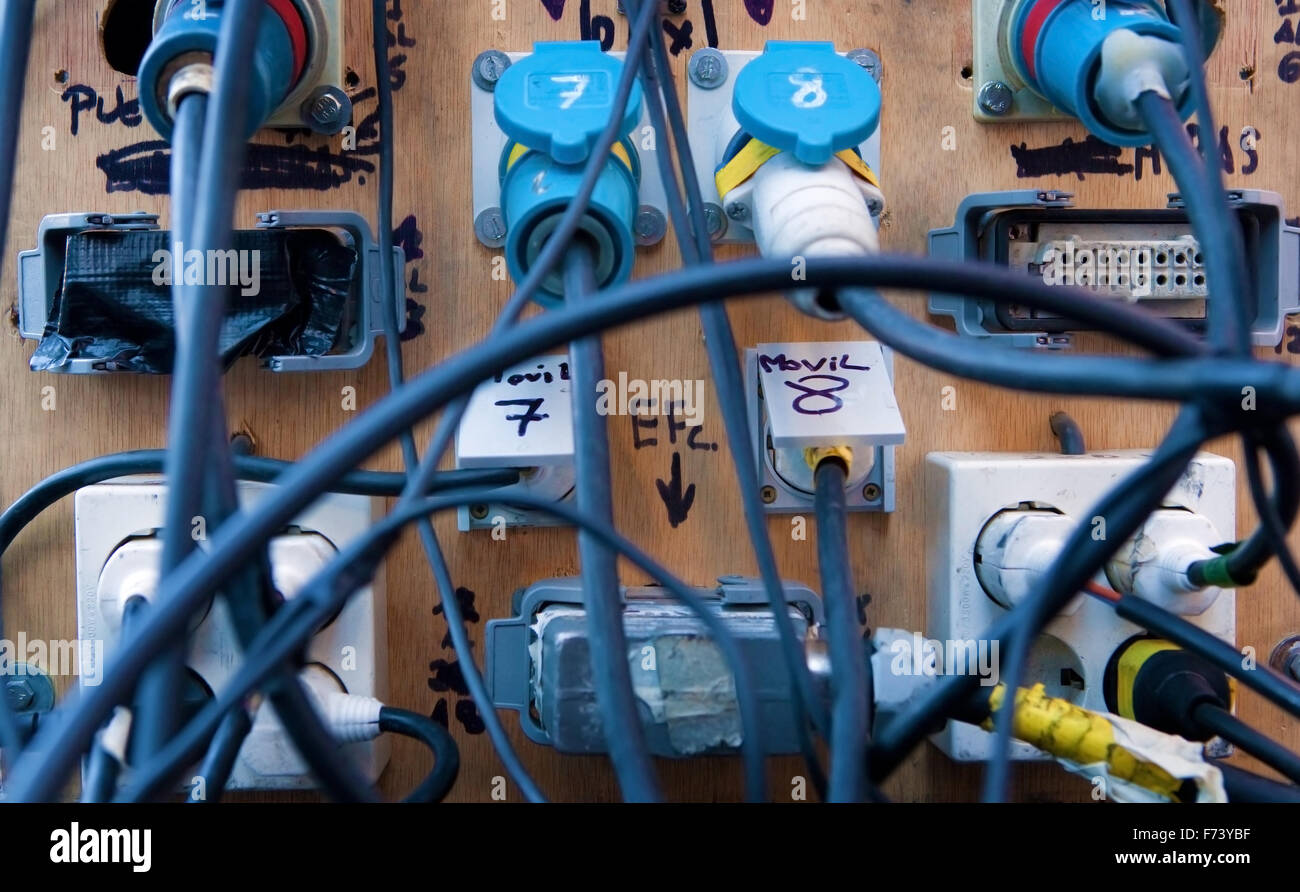 Close up image of cable chaos Stock Photo - Alamy