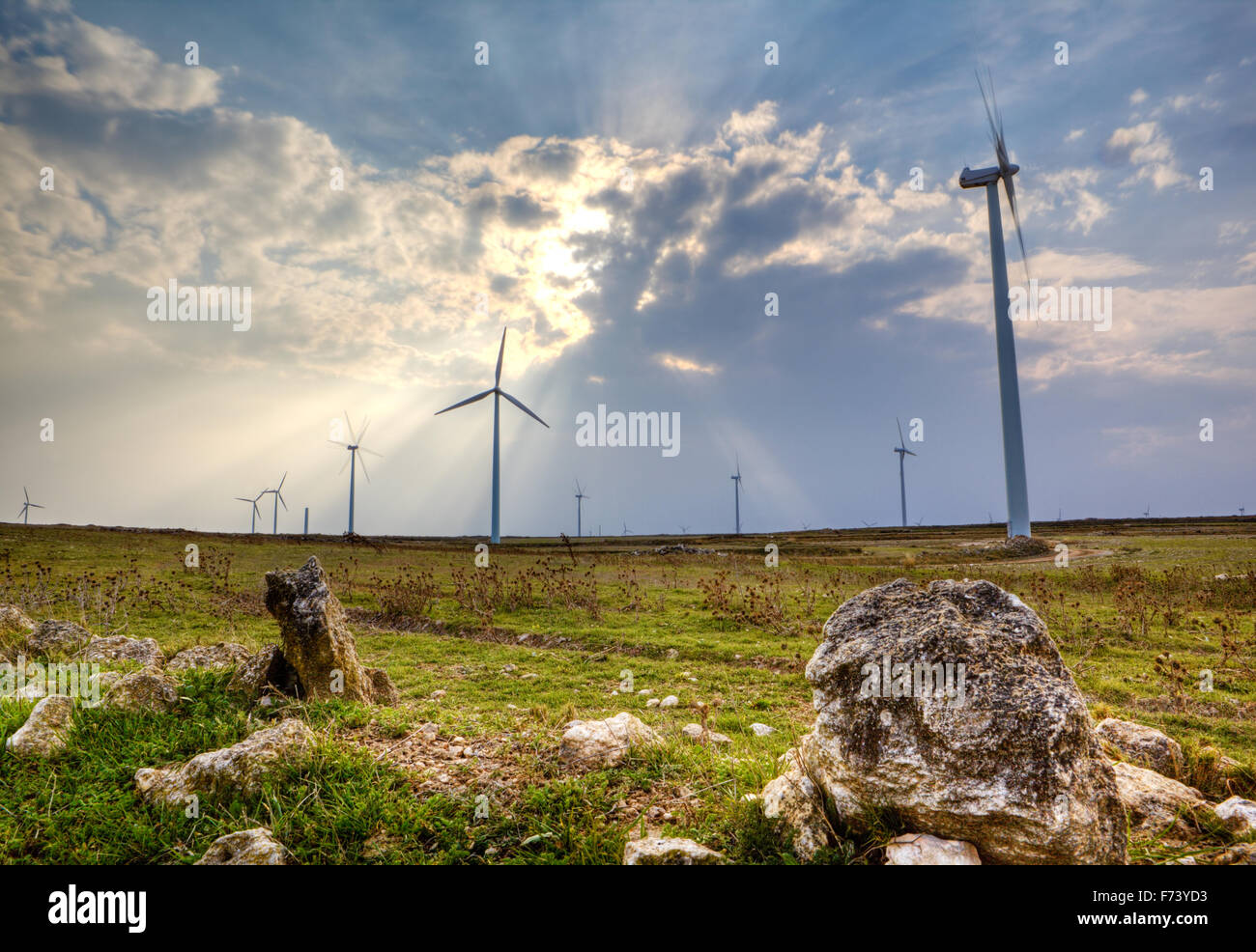 Landscape with wind turbine and fields Stock Photo - Alamy