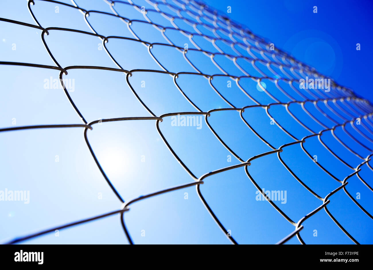 Abstract background with metal fence and sunshine Stock Photo - Alamy