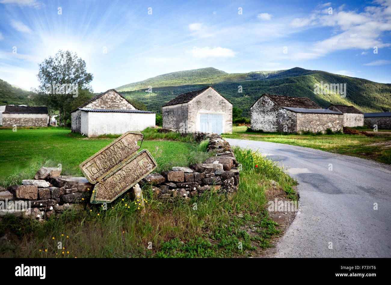 Rural landscape with mountain village and sunset Stock Photo - Alamy