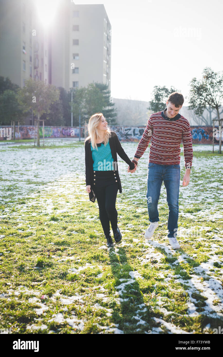 Lovers walking hand in hand hi-res stock photography and images - Alamy