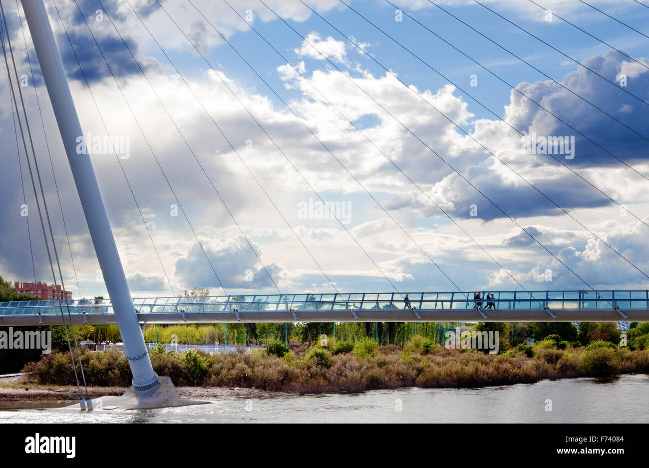 Cityscape with modern bridge and people Stock Photo - Alamy