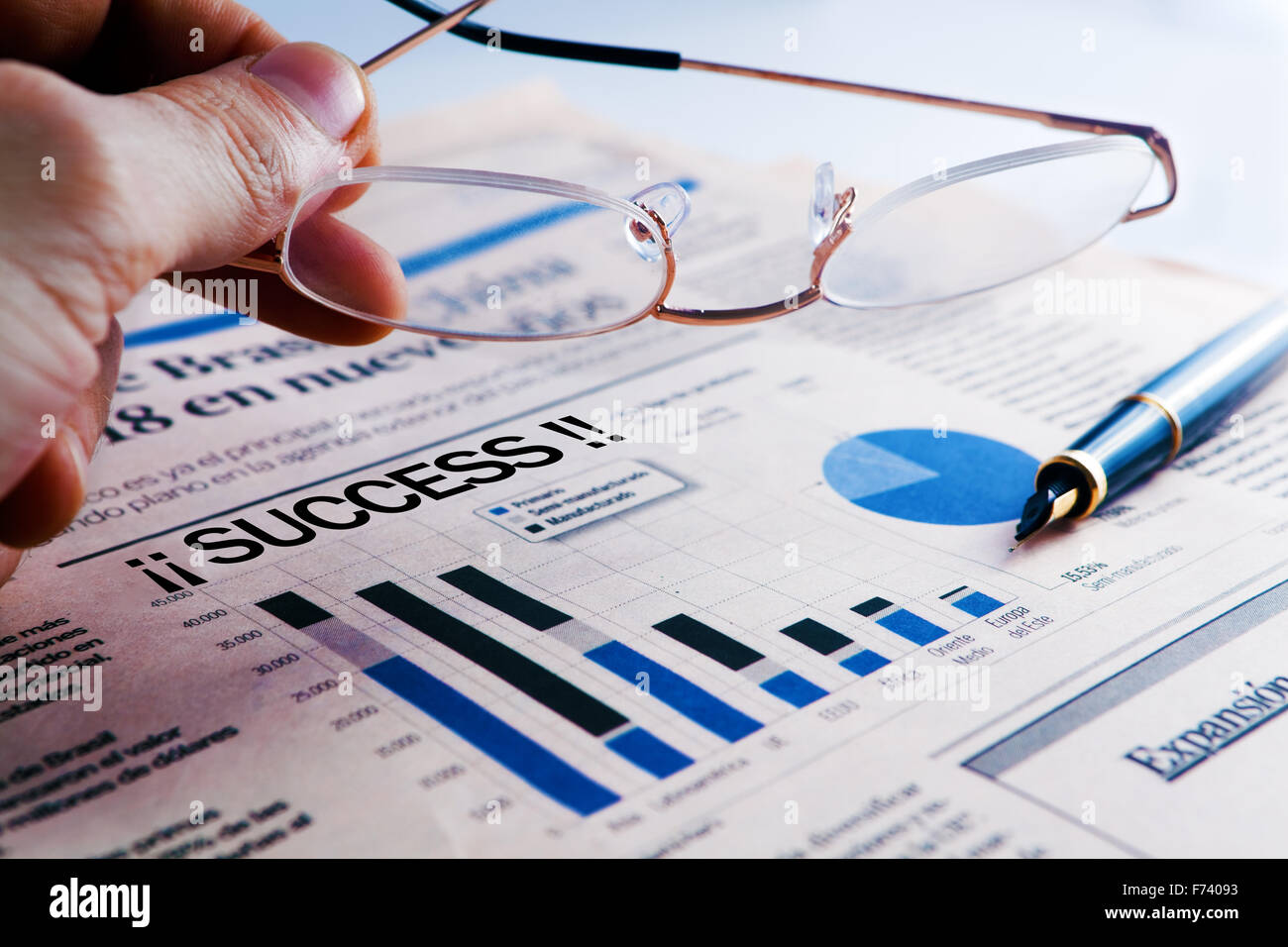 Business success with statistics and business man Stock Photo - Alamy