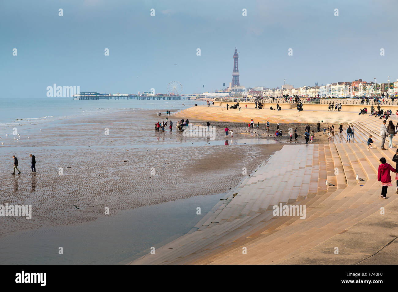 Steps leading to the beach along Blackpool promenade with the North ...