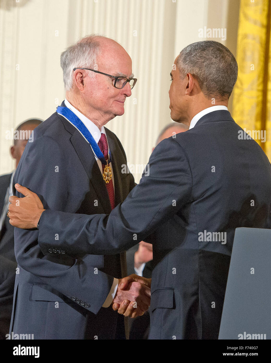 Former Nixon Administration official William Ruckelshaus shakes hands ...