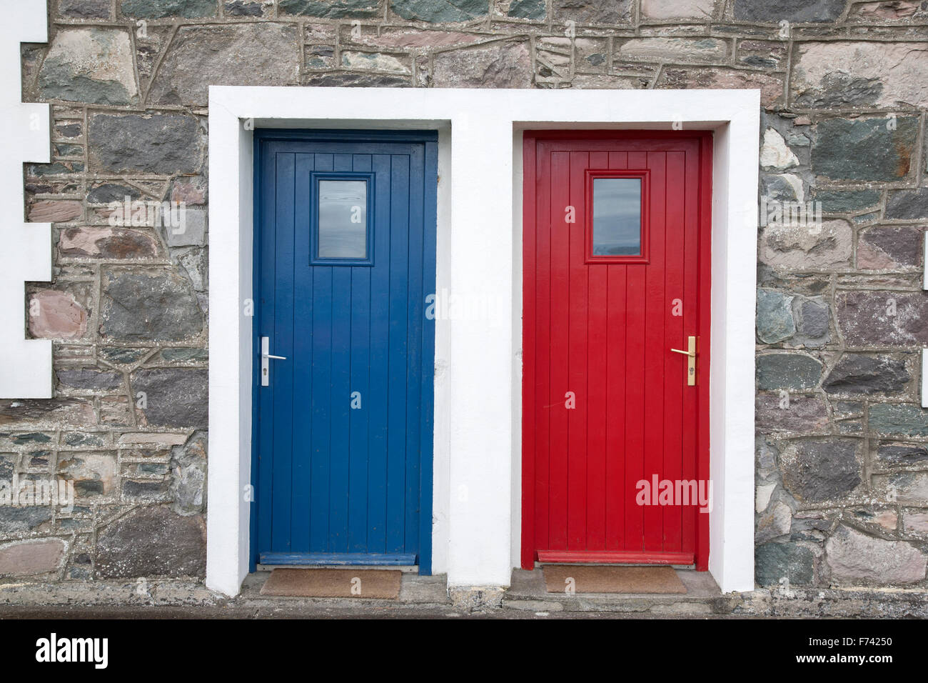 Red and Blue Door on House Facade Stock Photo - Alamy
