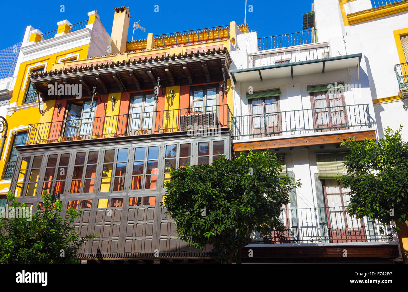 beautiful streets full of typical color of the Andalusian city of ...