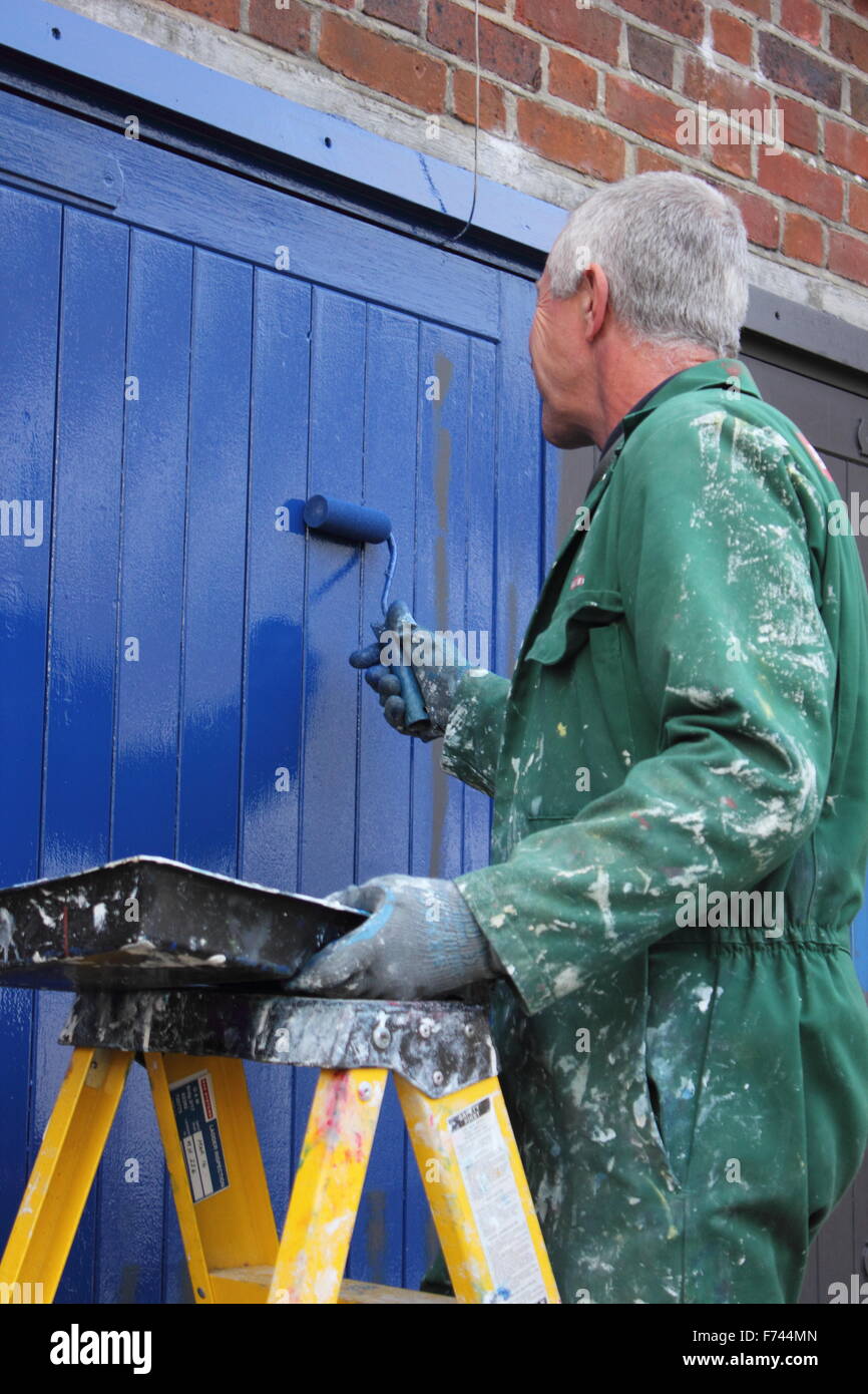 A painter at work Stock Photo - Alamy