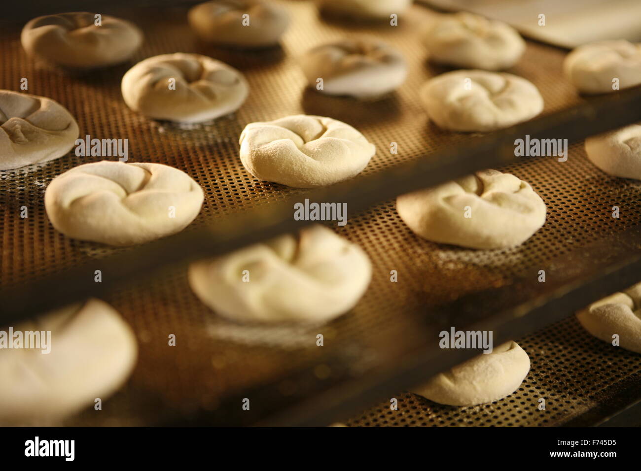 several dough on a griddle Stock Photo - Alamy