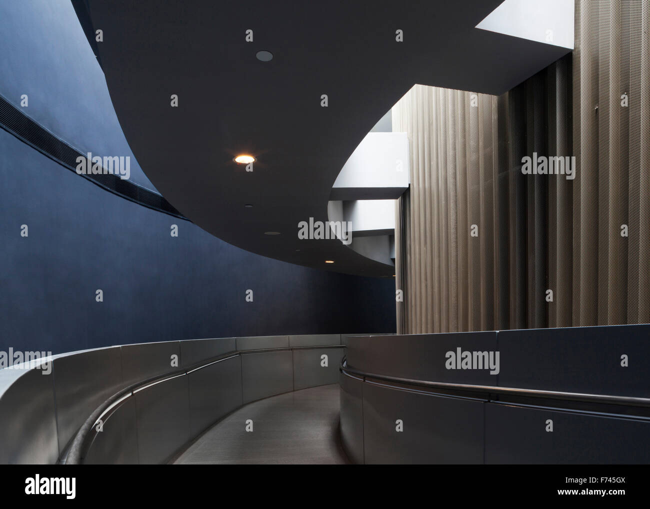 Walkway leading to gallery space in modern rotunda extension to ...