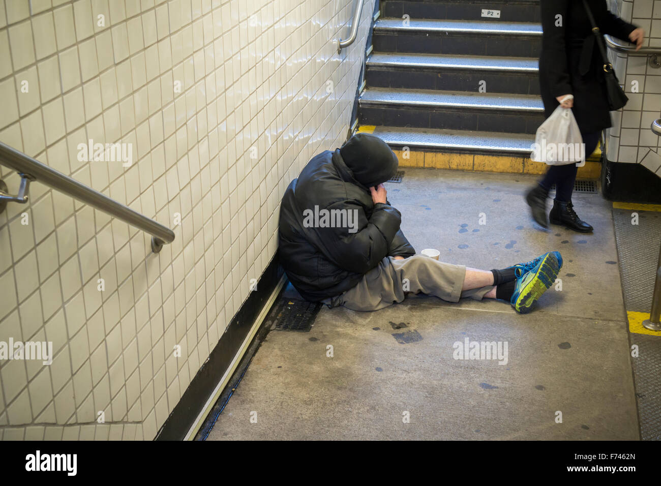 Homeless individual camps out in the 23rd Street subway station in the ...