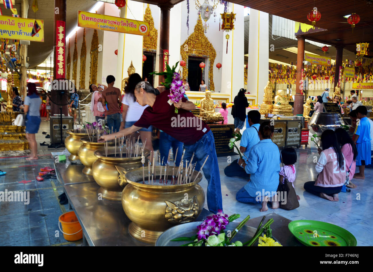 People praying Luang Pho Wat Rai Khing is a statue of Buddha at ...