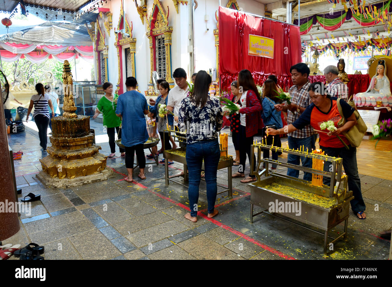 People praying Luang Pho Wat Rai Khing is a statue of Buddha at ...