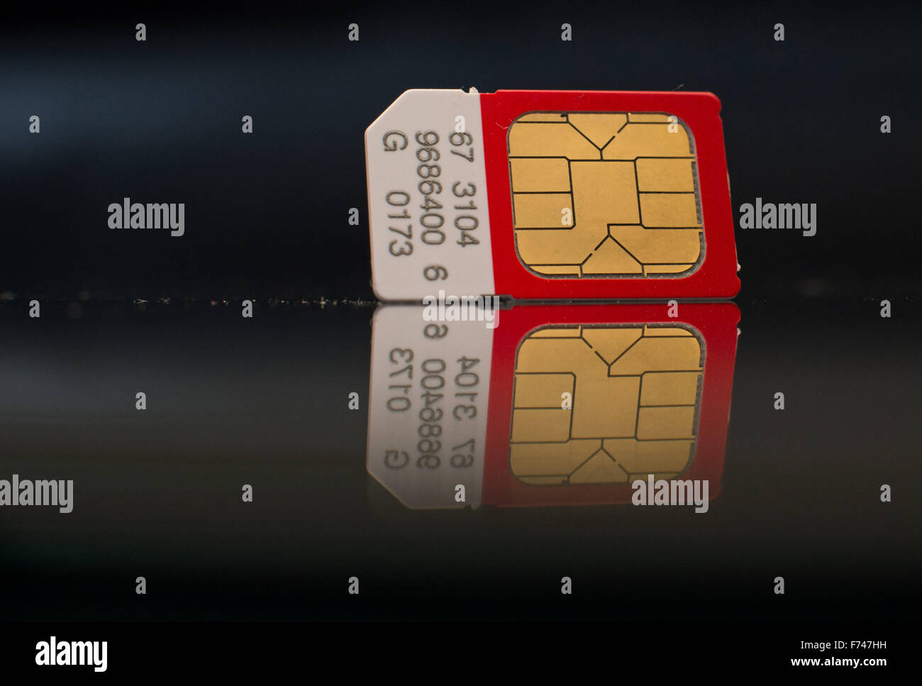 A SIM card sits on a mirror in Hanover, Germany, 24 November 2015. The ...