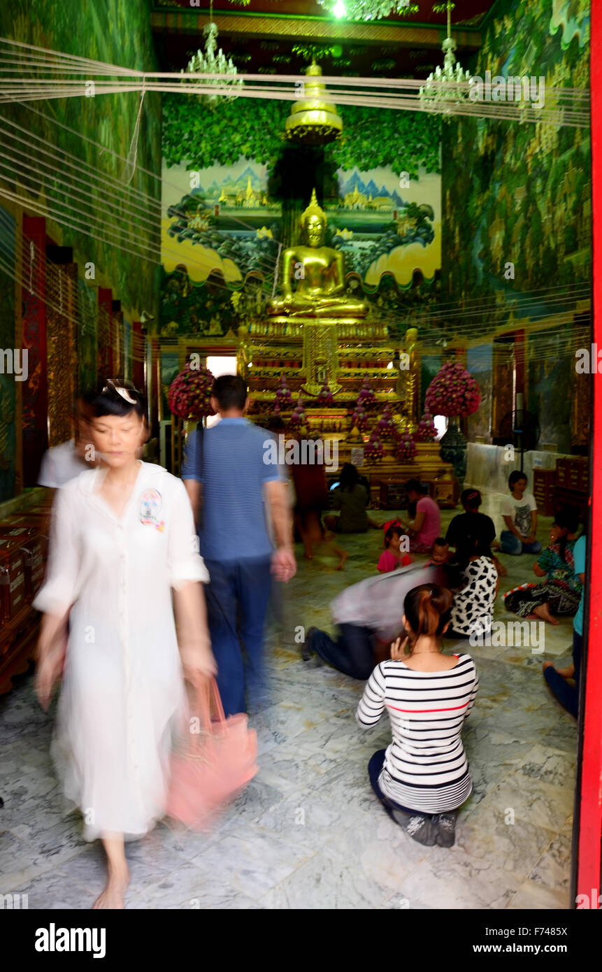 People praying Luang Pho Wat Rai Khing is a statue of Buddha at ...