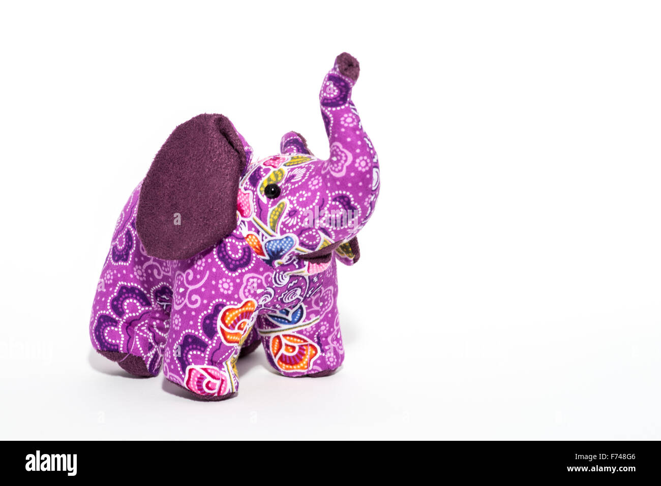 Purple fabric elephant Stock Photo - Alamy