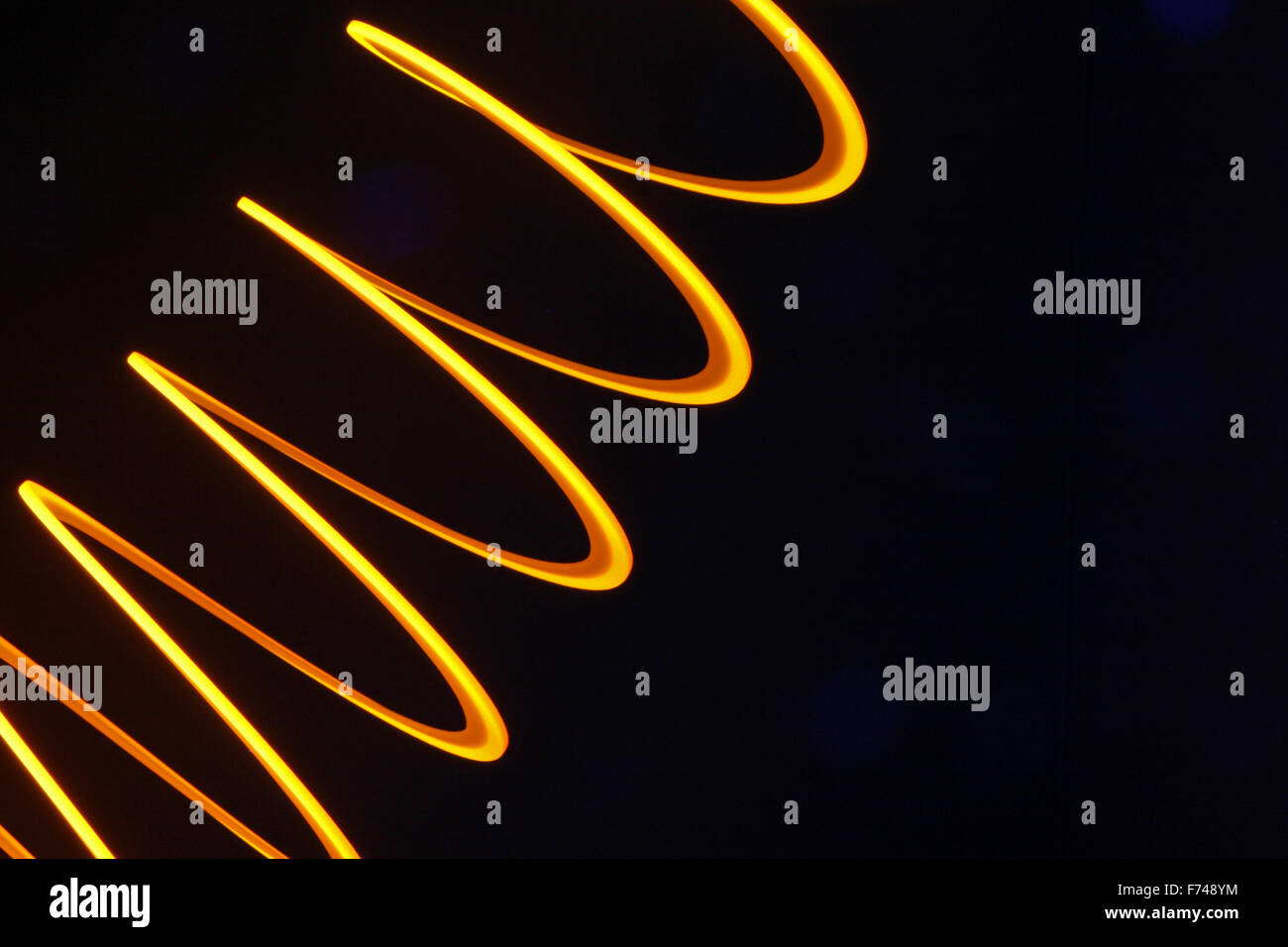 Plastic coil under blacklight Stock Photo - Alamy