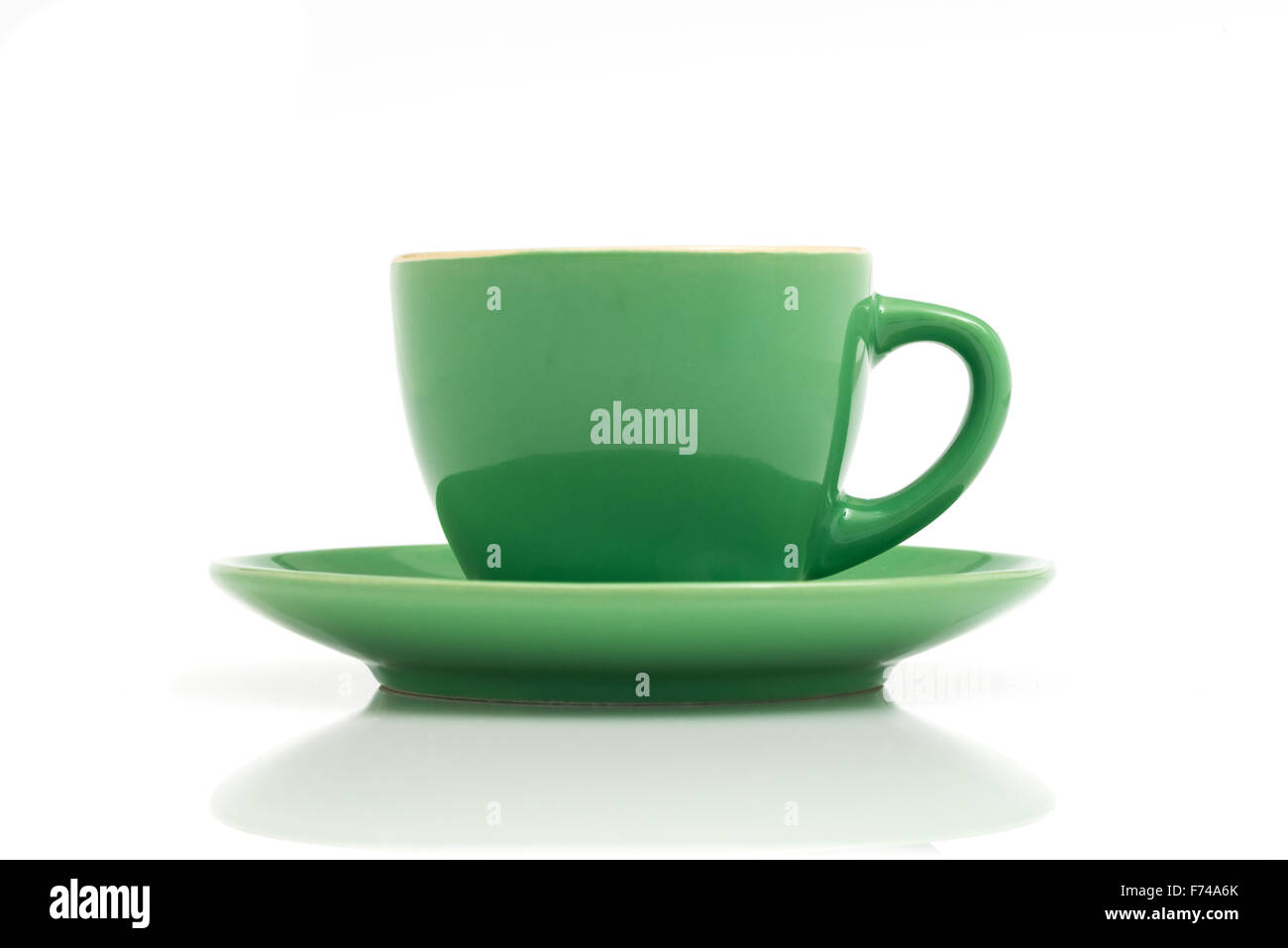 Green espresso cup and saucer isolated on white background Stock Photo ...