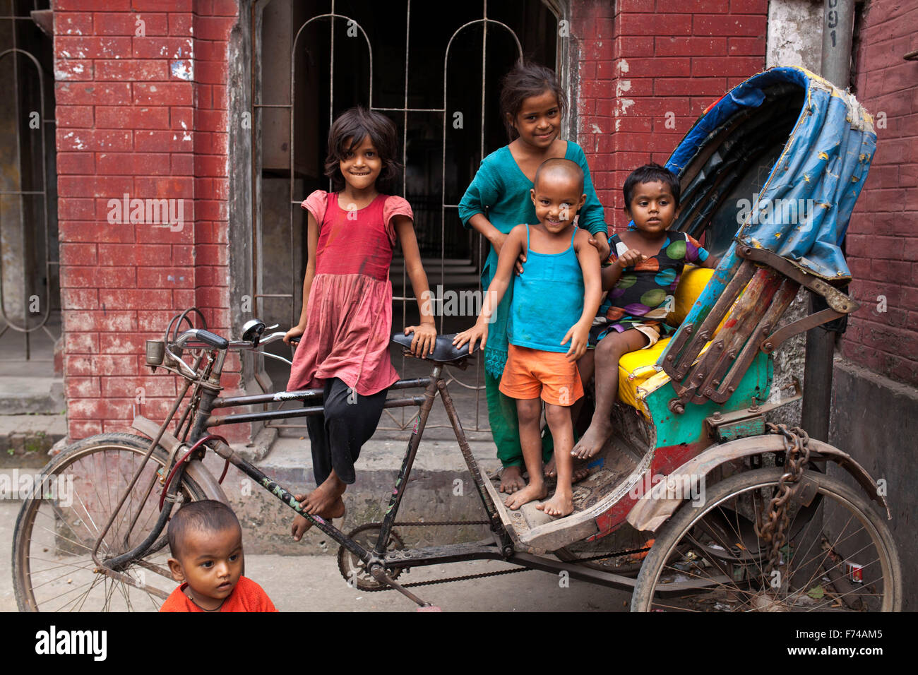 DHAKA, BANGLADESH 17th November: Street children playing in front of ...