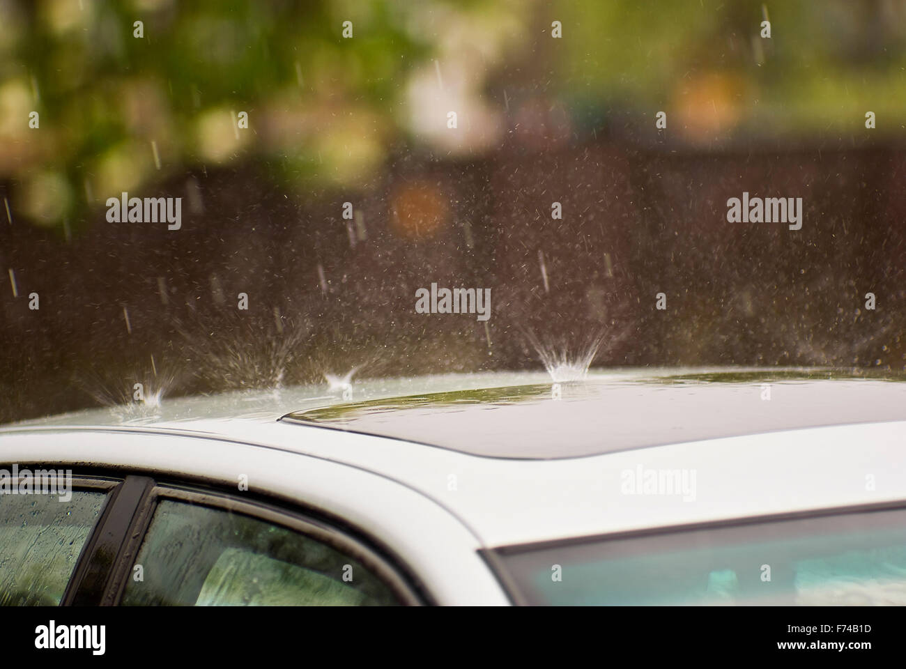 Rain on car Stock Photo - Alamy