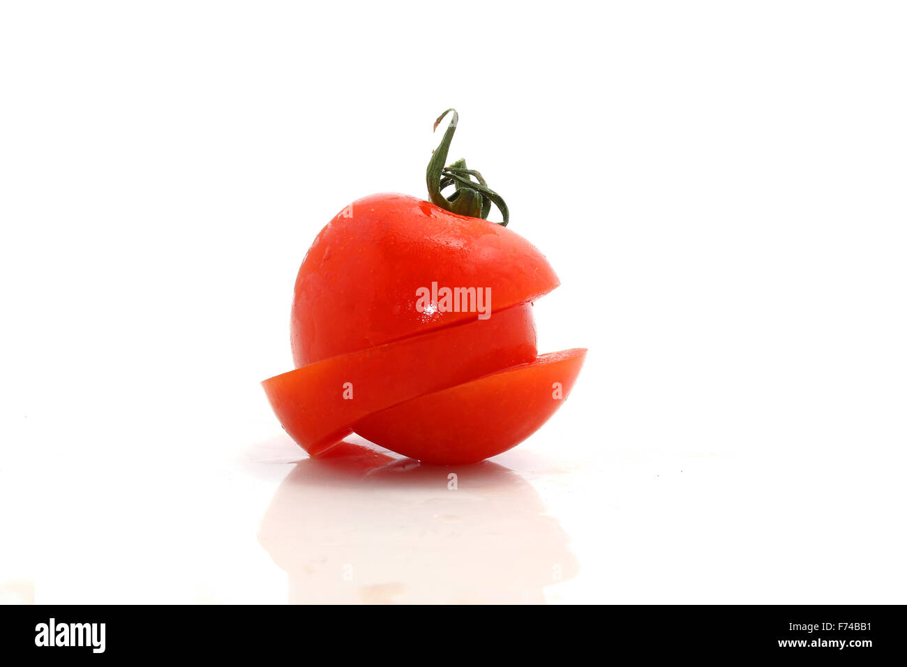 a cut tomato Stock Photo - Alamy