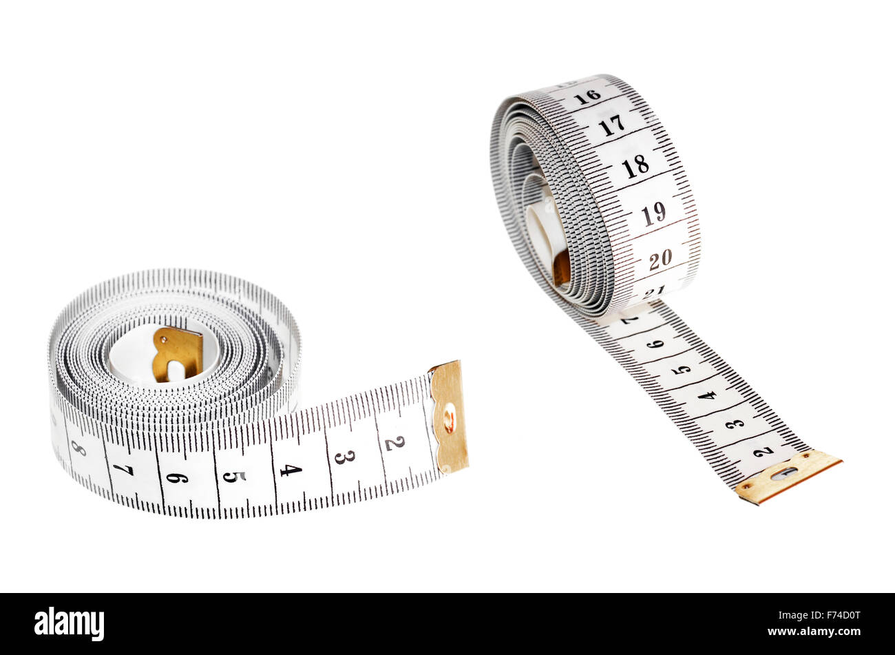 Measuring tape on white Stock Photo - Alamy