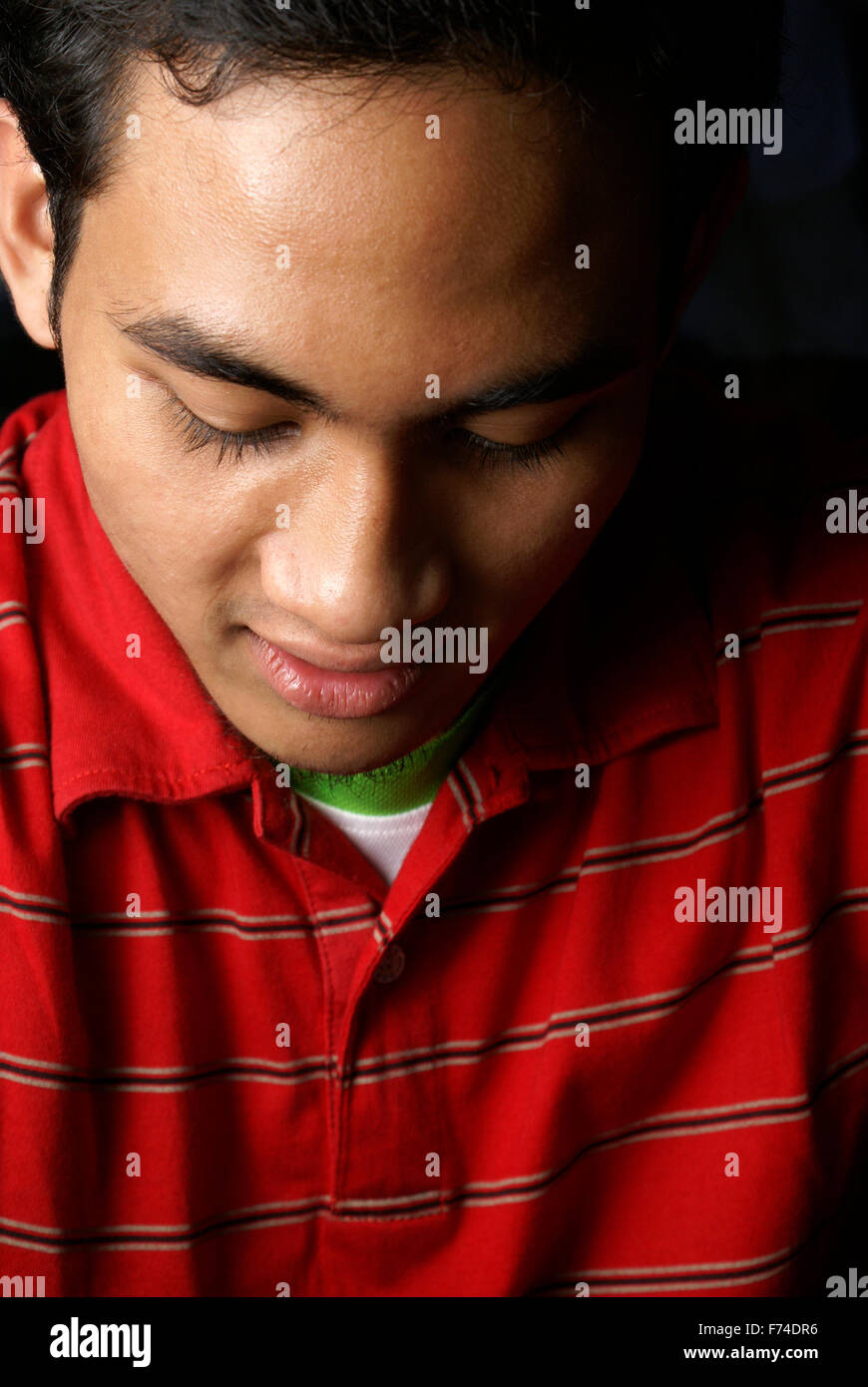 Sad young asian man Stock Photo - Alamy
