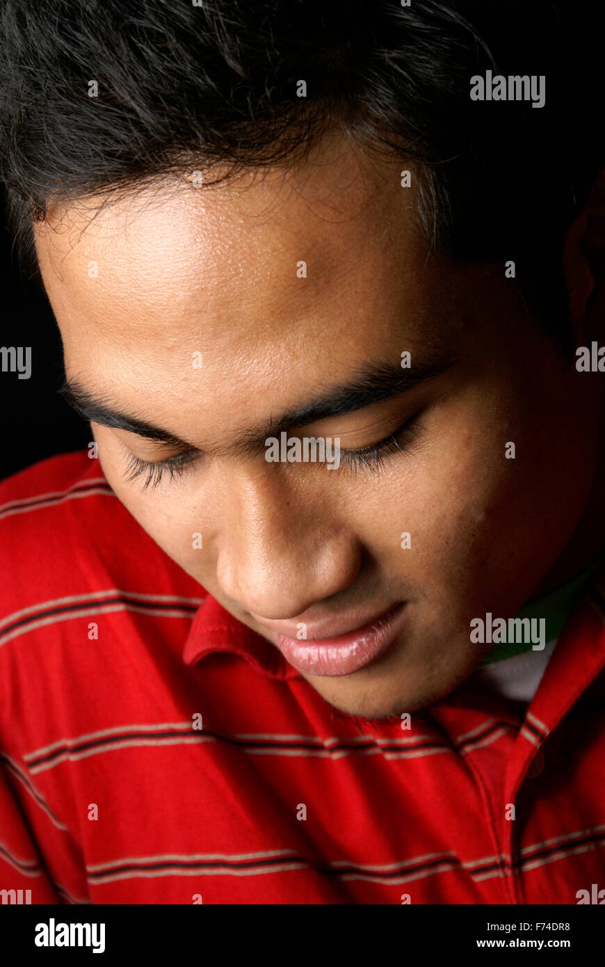 Sad asian man Stock Photo - Alamy