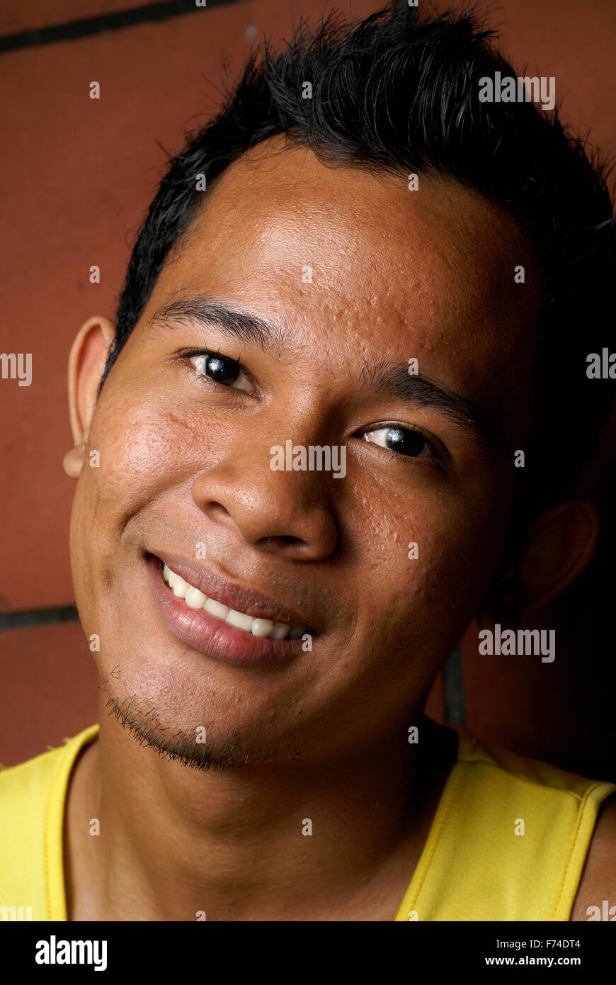 Friendly young asian man portrait Stock Photo - Alamy