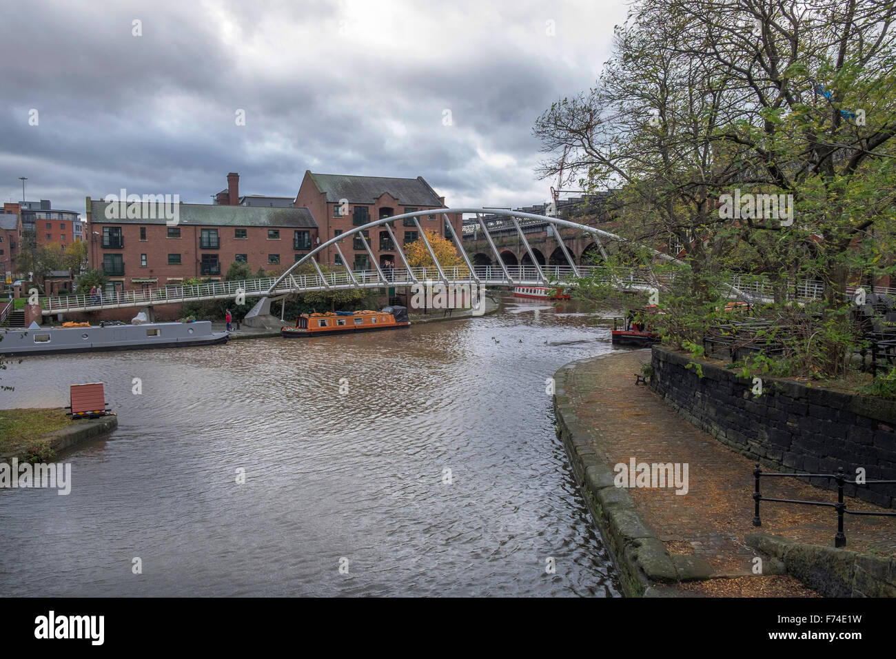 Footbridge spanning the Rochdale canal in Castlefield, Manchester with ...