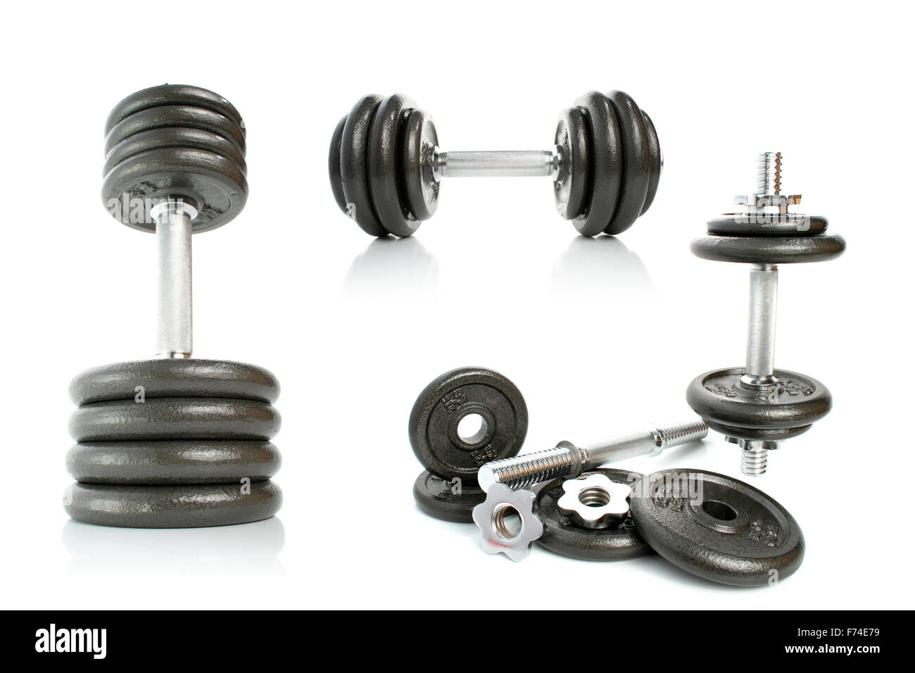Iron dumbbells set solated on white Stock Photo - Alamy