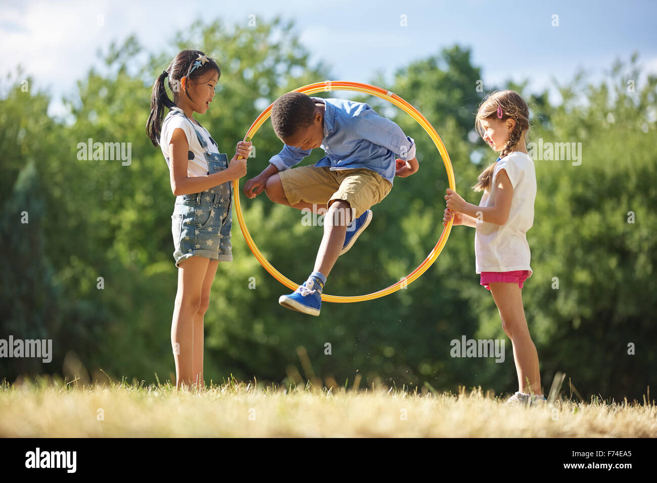Jumping through hoop hi-res stock photography and images - Alamy
