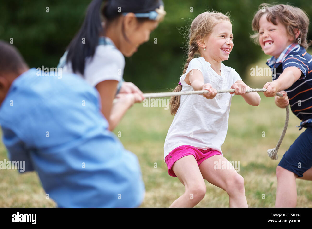 Children playing tug war hi-res stock photography and images - Alamy