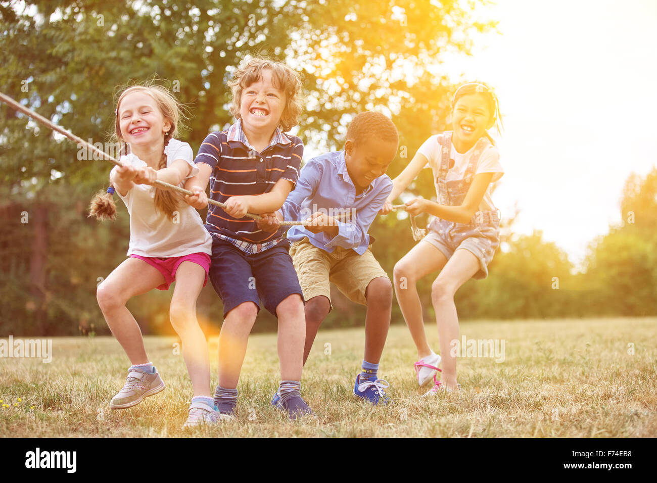 Kids tug of war hi-res stock photography and images - Alamy