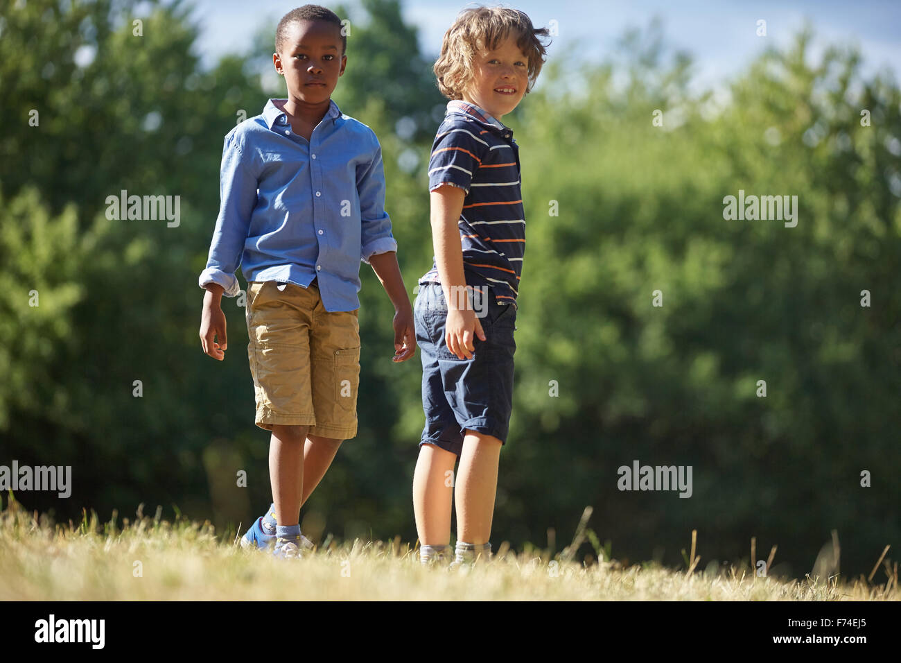 Two boys looking at hi-res stock photography and images - Alamy