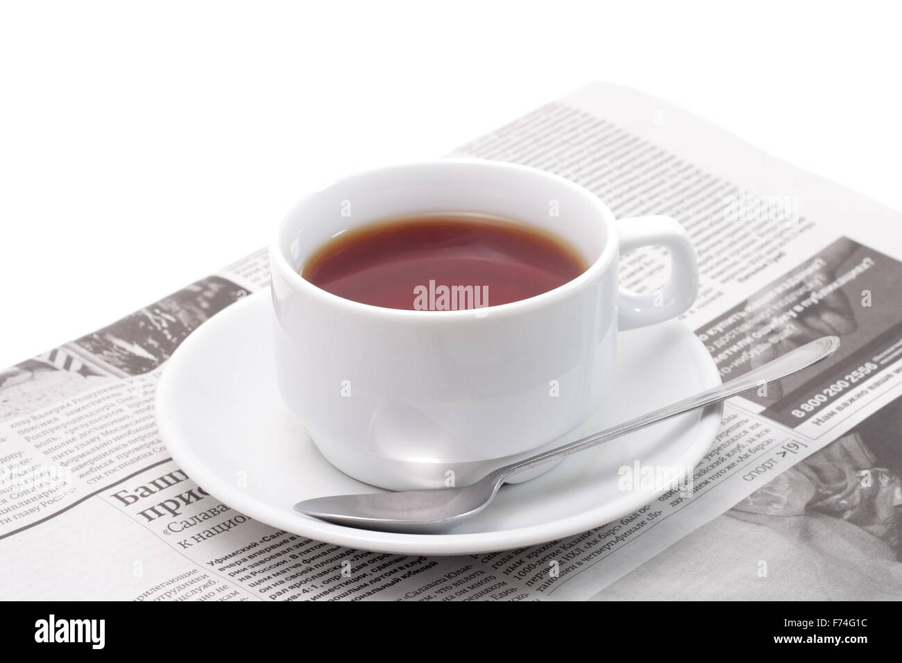 Tea and newspaper Stock Photo - Alamy