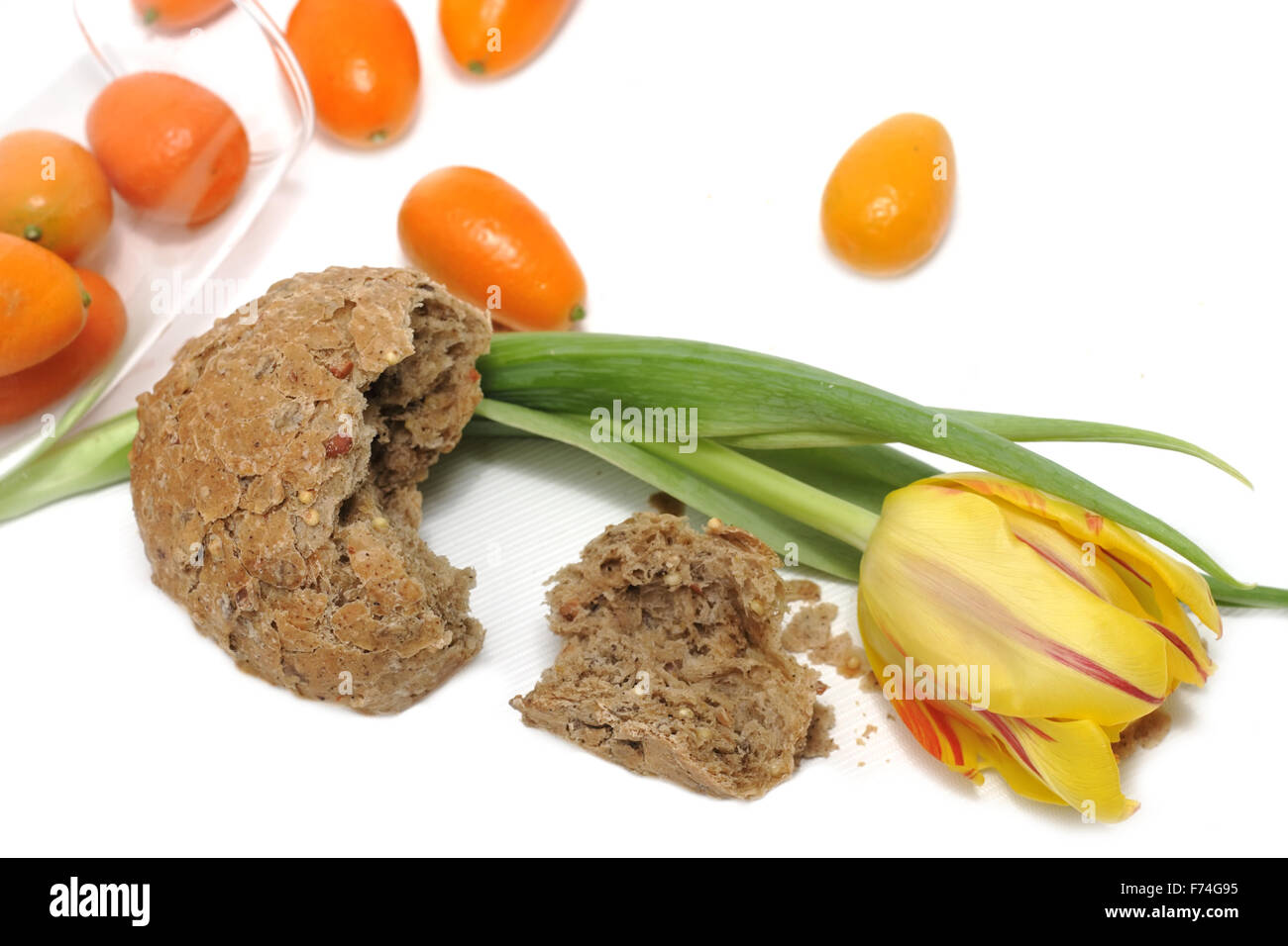Tulip, bread and kumquats Stock Photo - Alamy