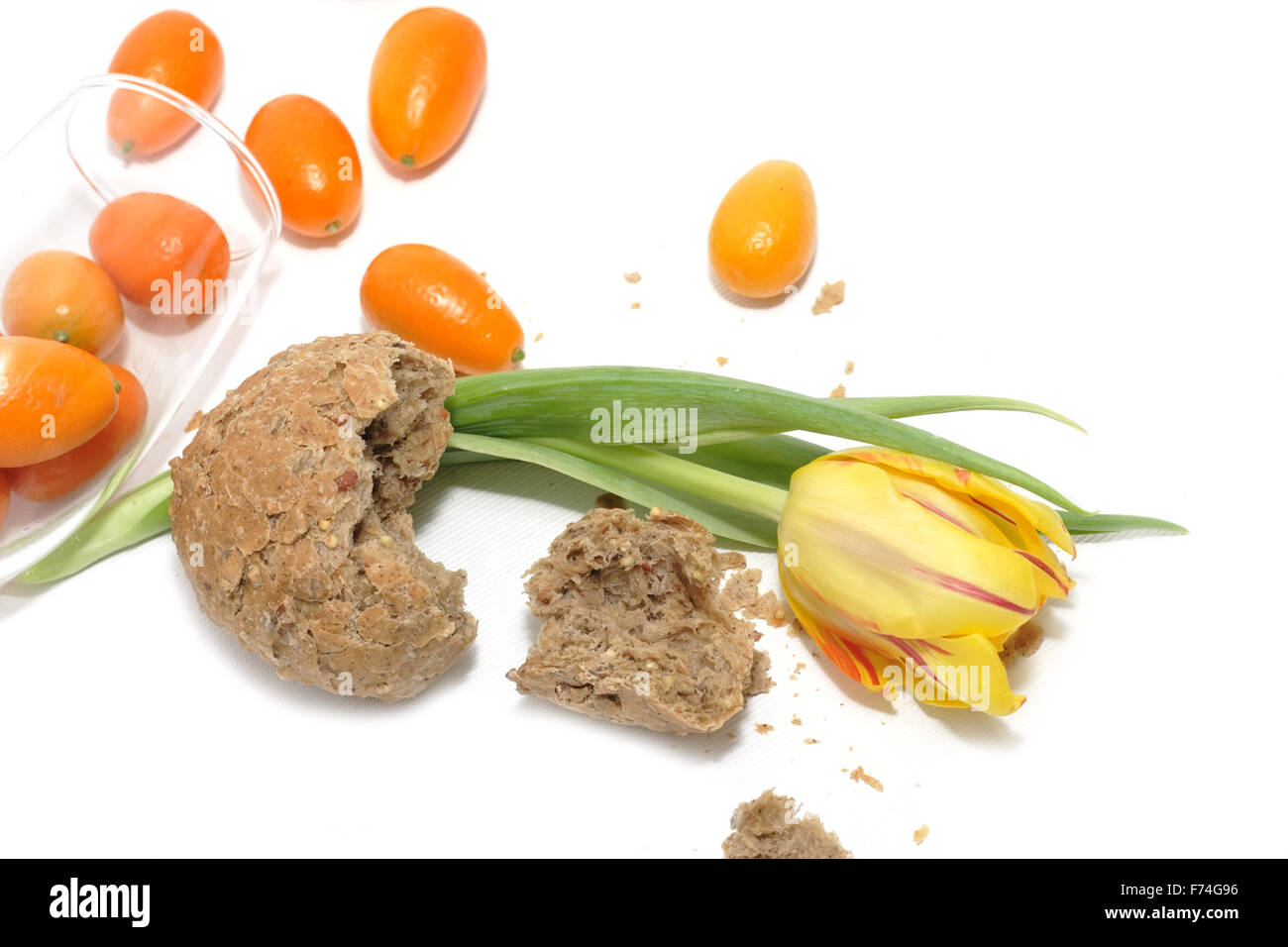 Tulip, bread and kumquats Stock Photo - Alamy