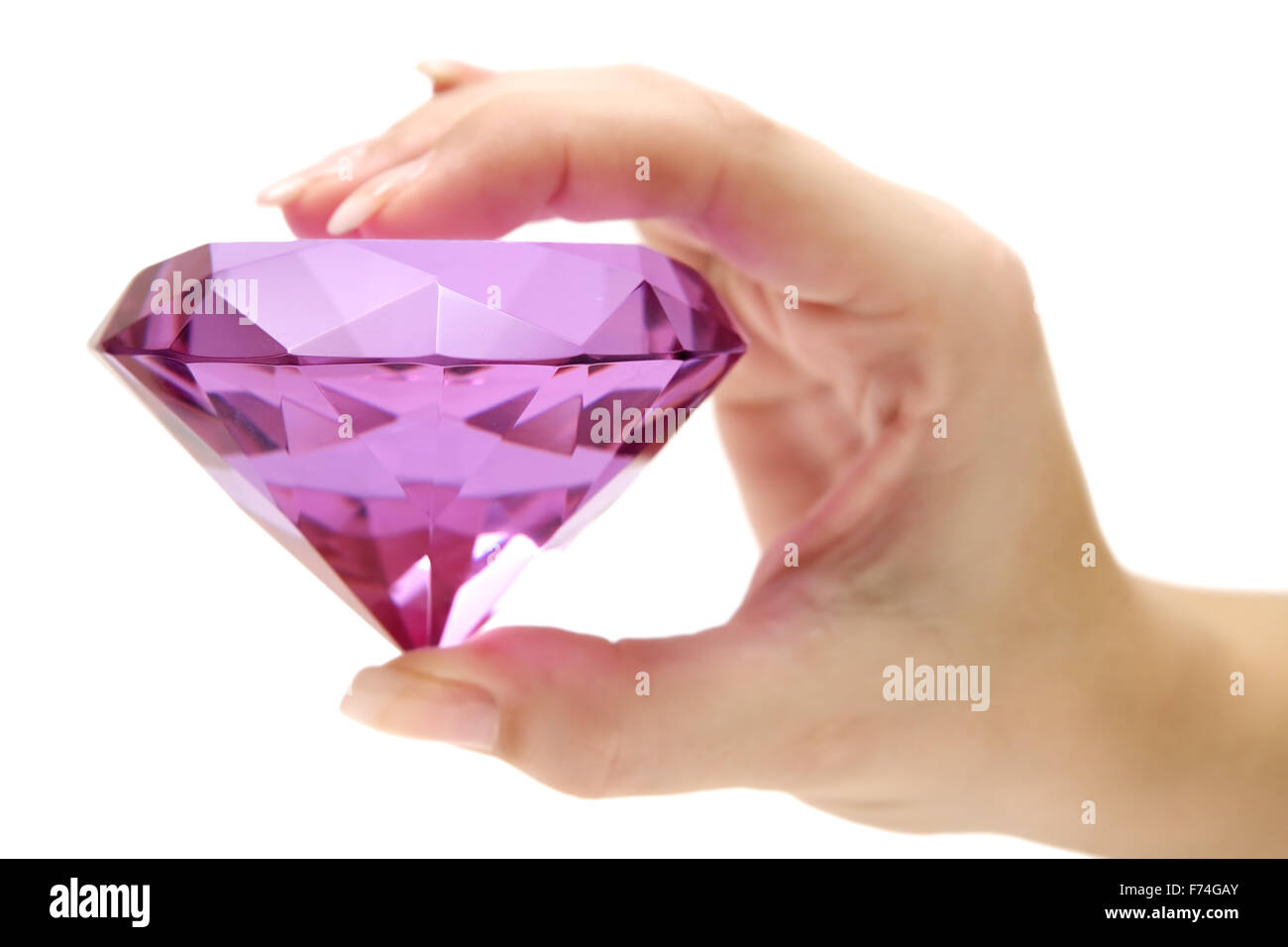 Hand holding gemstones hi-res stock photography and images - Alamy