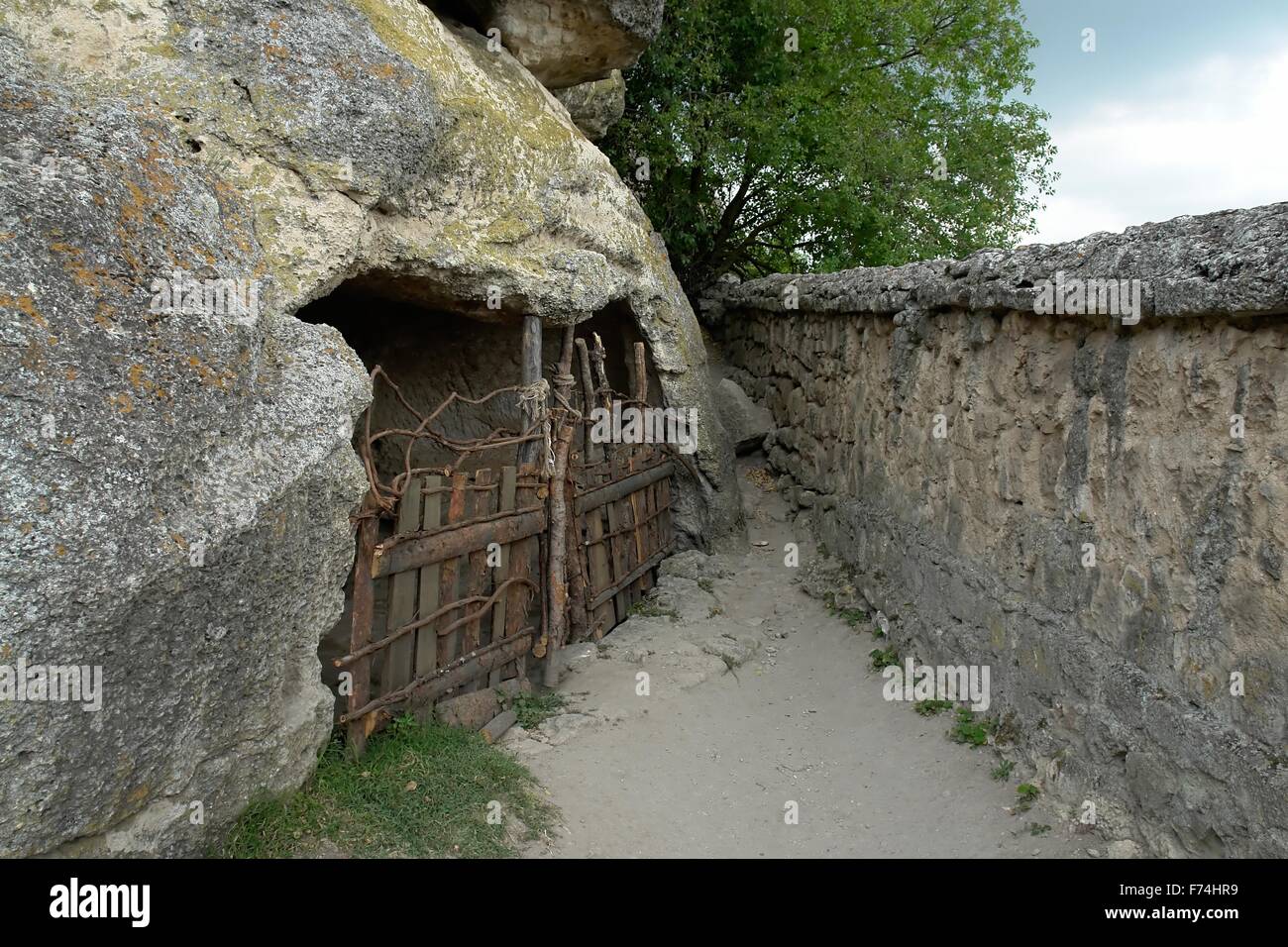 Entrance into cave Stock Photo - Alamy