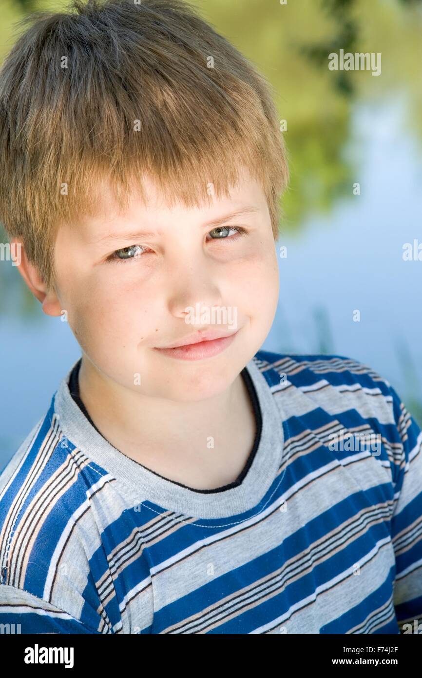 boy with river at background Stock Photo - Alamy