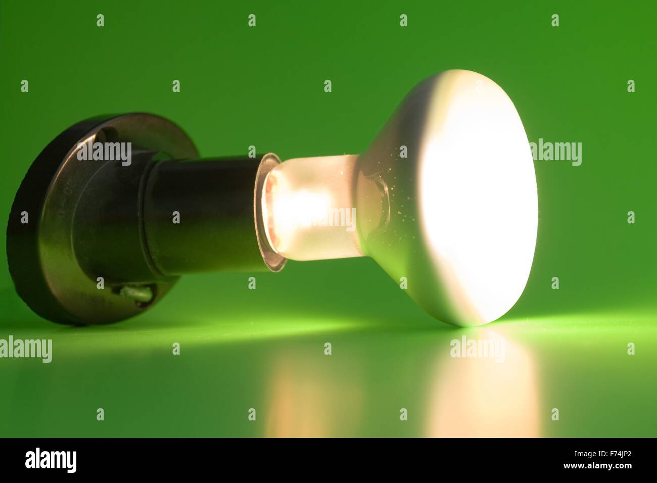 Glowing light bulb Stock Photo - Alamy