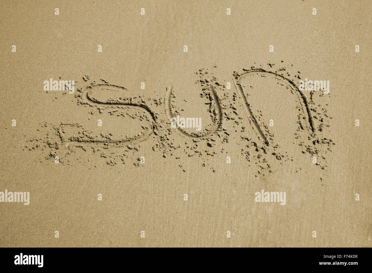 sun in sand Stock Photo - Alamy