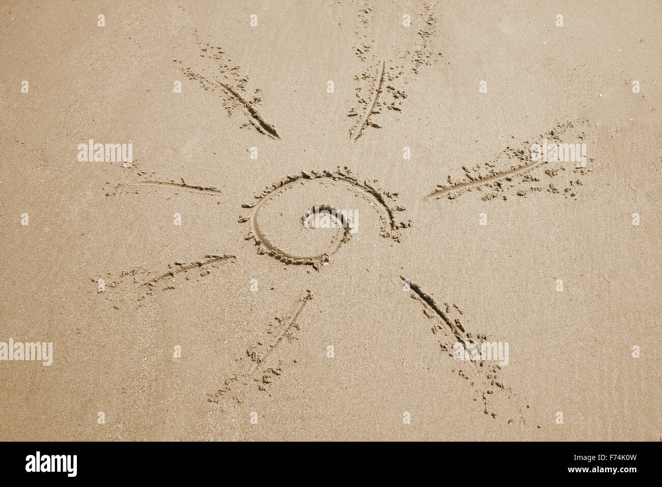 sun in sand Stock Photo - Alamy