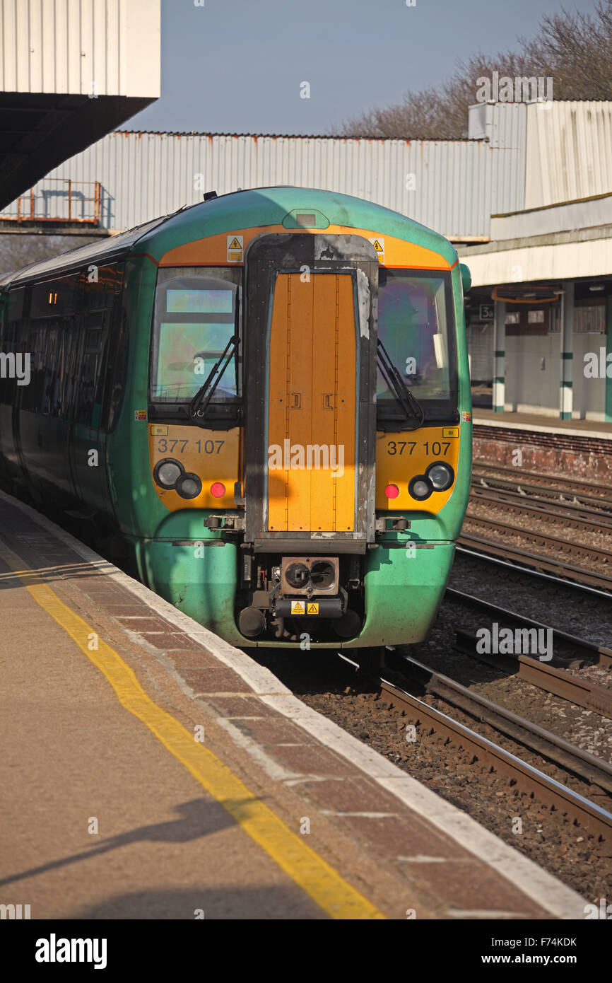 Electric Multiple Unit (E.M.U.) sat on the up platform at Redhill ...